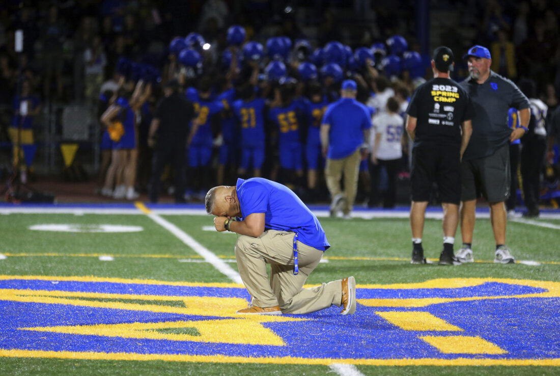 Football coach who got job back after Supreme Court prayer ruling ...